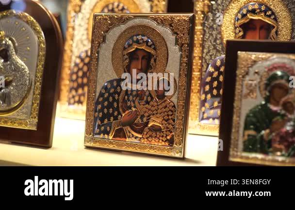 Slow close-up video of gilded Black Madonna and child religious icons ...