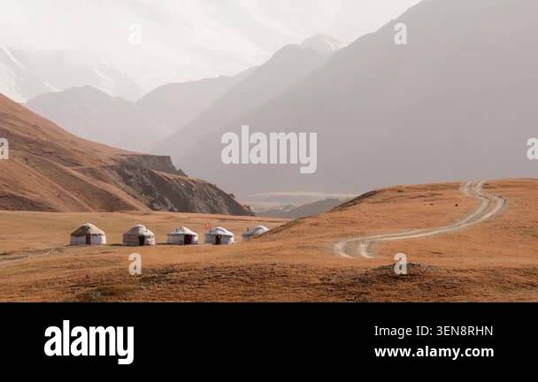 Traditional yurt camp in Achik-Tash valley, Kyrgyzstan. Row of nomadic ...
