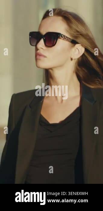 white woman with windblown hair captured in cinematic profile ...