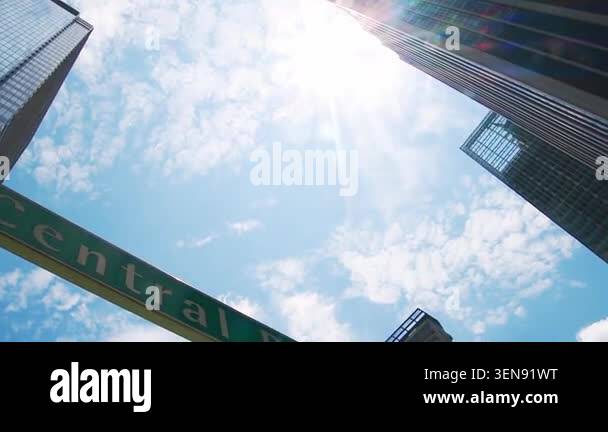 Singapore CBD Central Blvd street sign and V on Shenton skyscraper. Low ...