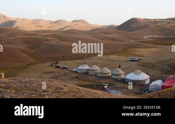 Traditional yurt camp in Achik-Tash valley, Kyrgyzstan. Row of nomadic ...
