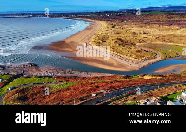 Aerial View of Sandy Beach and River Mouth with Coastal Road Below. An ...