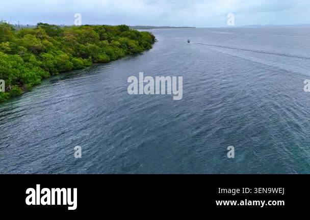 Motorboat on Mangrove Channel Bocas del Toro Overcast. A small ...