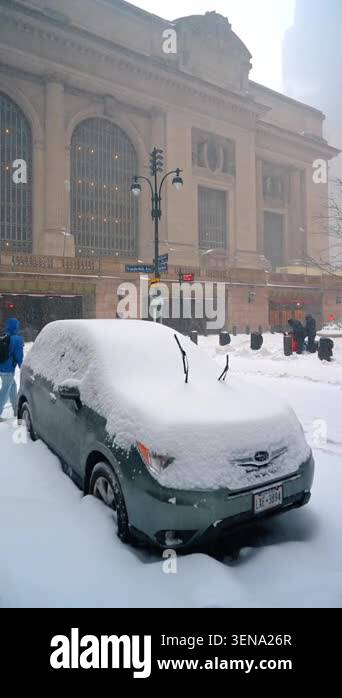 New York, USA, 9 January 2026: Car covered in thick snow outside Grand ...