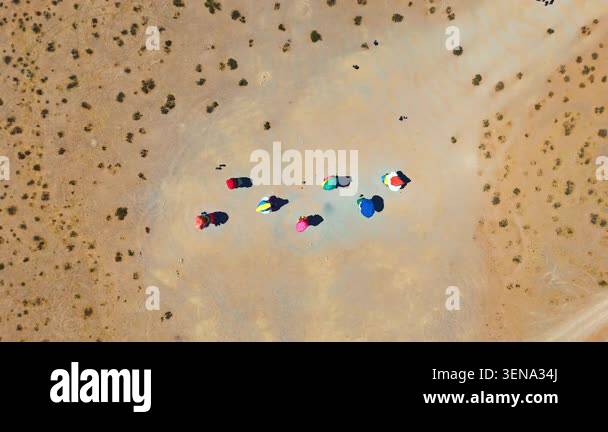 View on the art installation of seven towers of painted boulders. Dry ...