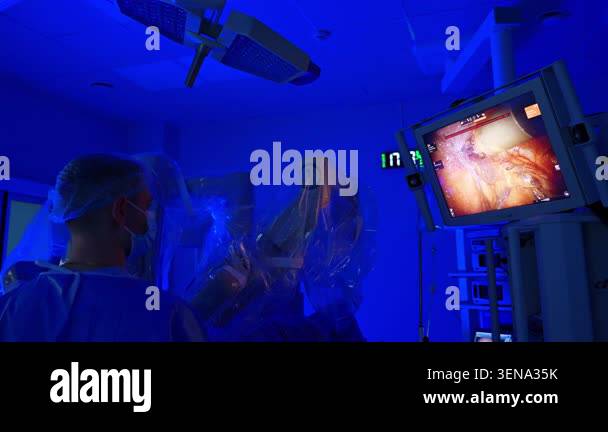 Kyiv, Ukraine, 5 May 2026: Surgeon monitoring robotic laparoscopic feed ...
