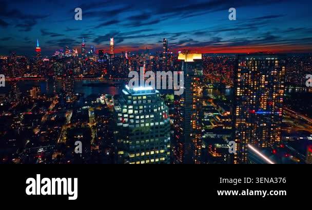 Flyover the tops of skyscrapers with neon lights. Iconic scenery of New ...