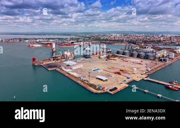 Flying away from large open area for containers in the modern port ...
