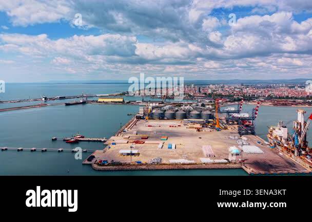 Flight along the maritime facility with some containers, cranes and ...