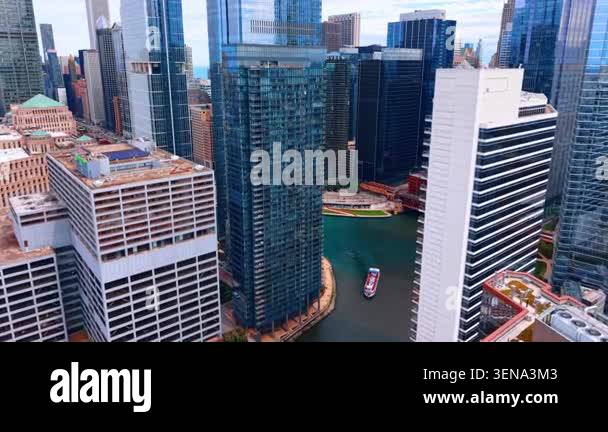 Flight among the facades of high-rises in downtown Chicago. Drone ...
