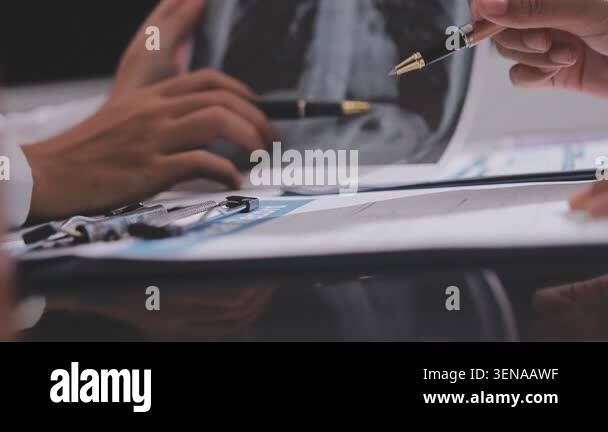 close up. male doctor examining x - ray at the hospital Stock Video ...