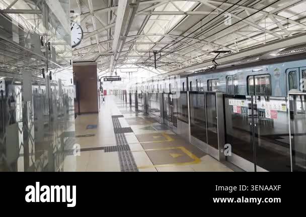 Wide, clean static shot showcasing a modern underground or elevated ...