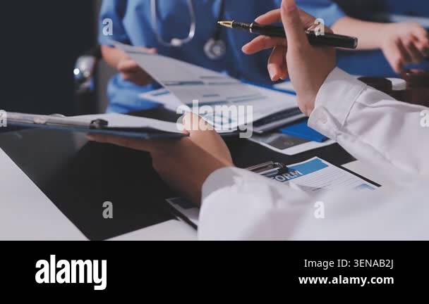 doctor working with a medical report in office Stock Video Footage - Alamy