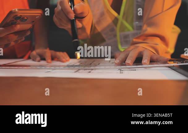 architect with blueprints on blueprint Stock Video Footage - Alamy