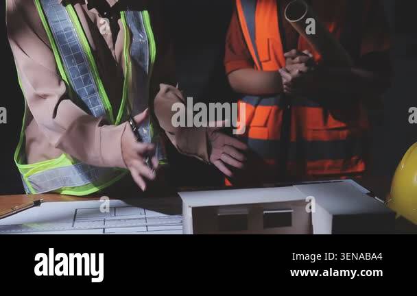 engineer working in construction site with blueprint. engineer ...
