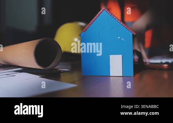 house model with blueprint Stock Video Footage - Alamy
