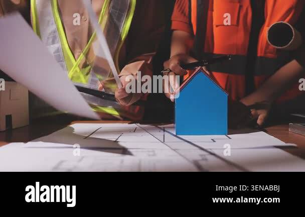 engineer or architect or engineer working with blueprint and house plan ...