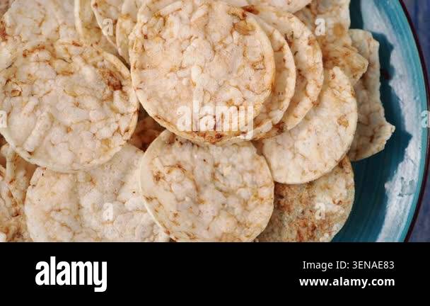 People share snacks made from crispy rice cakes at a gathering Stock ...