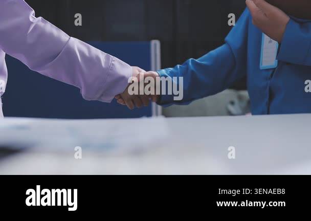 business people shaking hands after meeting Stock Video Footage - Alamy