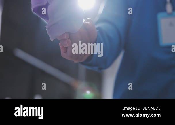 doctor shaking hands with patient Stock Video Footage - Alamy