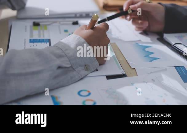 businessman working with financial graph on desk in modern office with ...