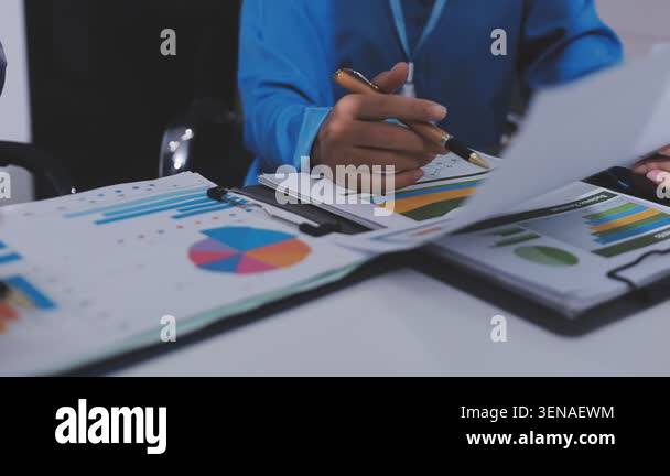 business people discussing and analyzing data in office. business ...