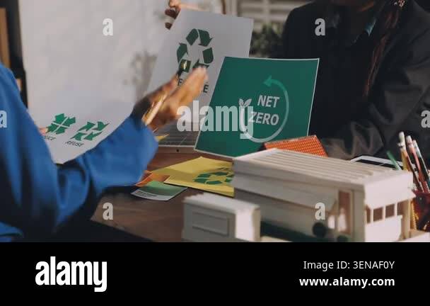 young female designer holding paper Stock Video Footage - Alamy