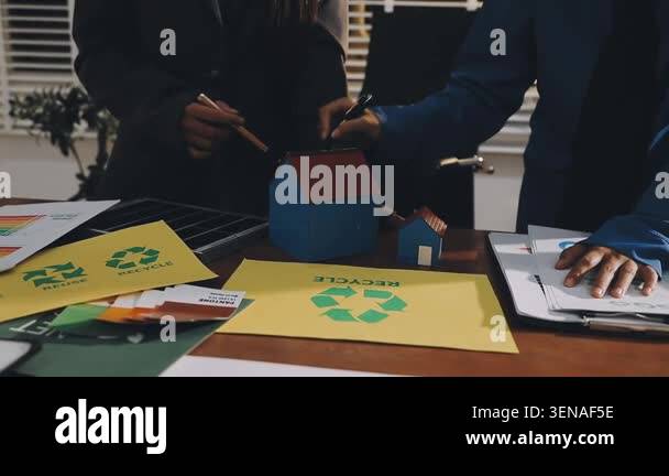 man putting paper recycling into bin with recycling sign, top view ...