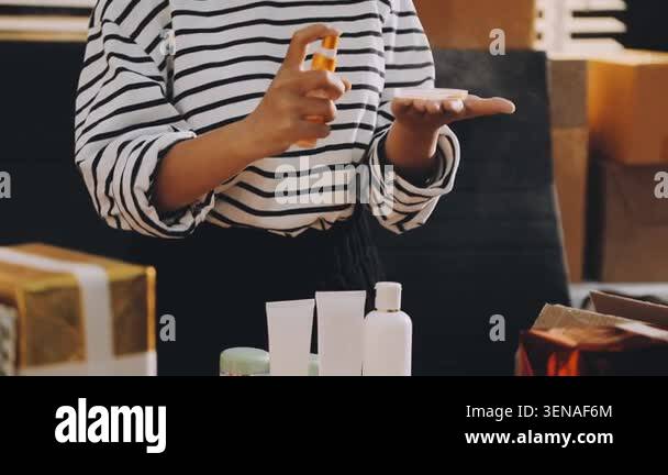 female hand choosing cosmetics in beauty store Stock Video Footage - Alamy