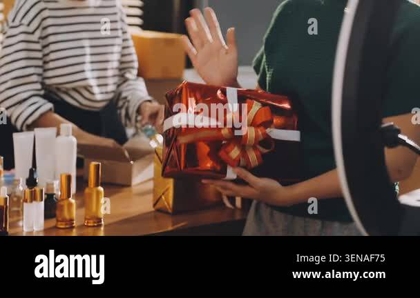 female hands holding a present box with a ribbon Stock Video Footage ...
