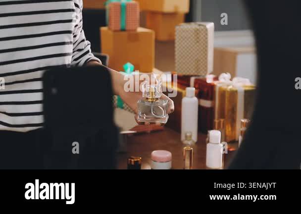 female hand holding bottles in a beauty store Stock Video Footage - Alamy