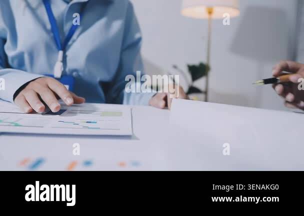 businessman writing on a clipboard at the desk in office Stock Video ...