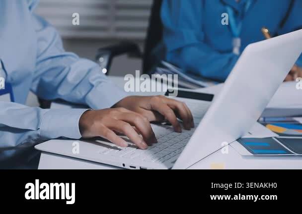 close up. a group of young business people working together. photo with ...
