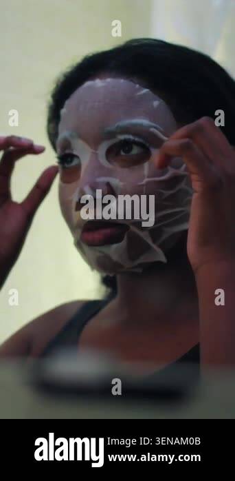 Young African American Woman unveiling nourished skin after beauty ...