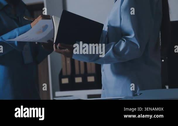 professional team working on laptop and analyzing data in modern office ...