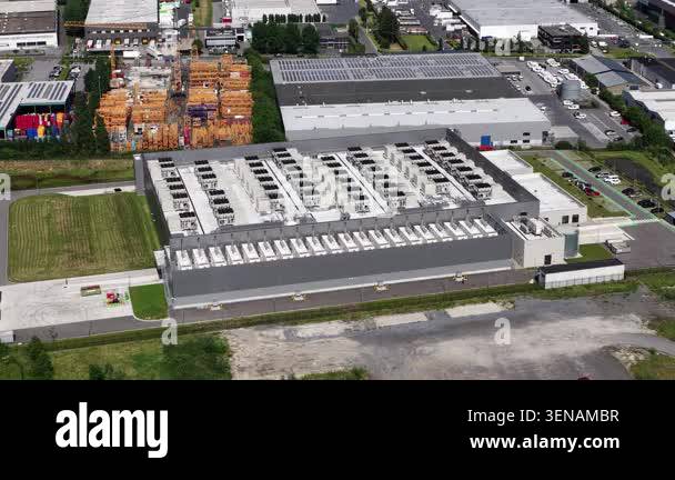 Large datacenter aerial view showing the massive cooling systems on the ...
