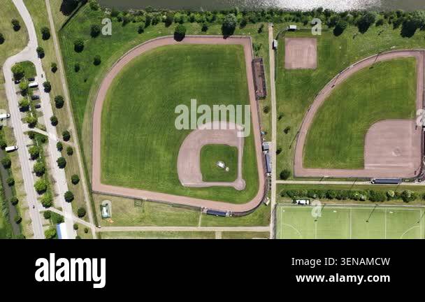 Birds eye view of empty baseball diamonds and sports fields in a ...