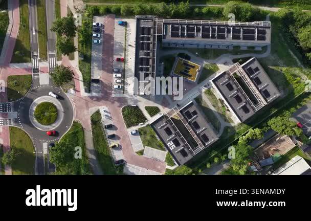 Rotating aerial perspective of a modern temporary housing complex ...