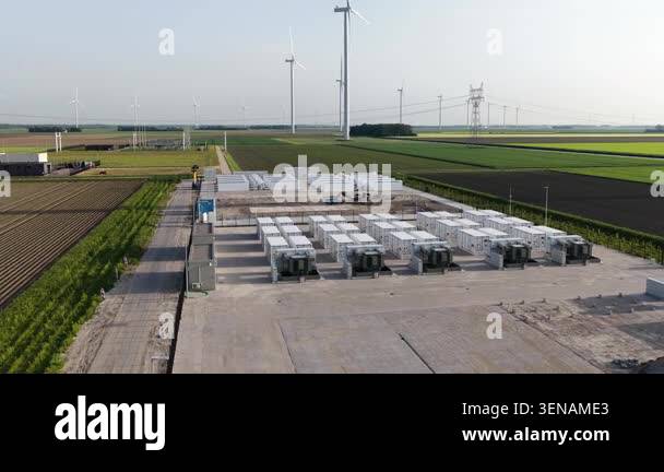 Aerial circling shot of a battery energy storage system facility ...