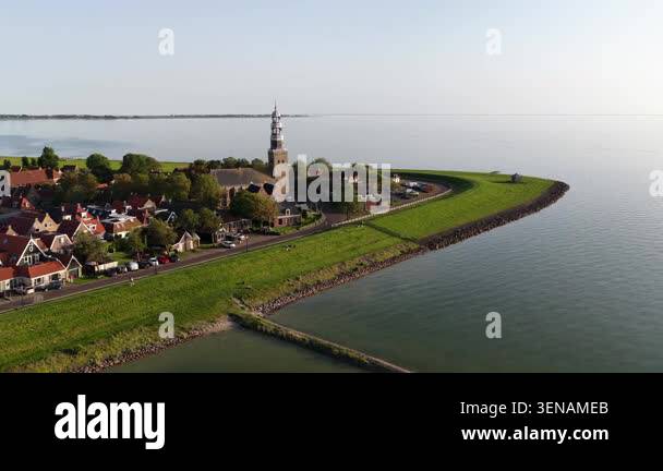Aerial drone view of the Grote Kerk Hielpen in Hindeloopen, Friesland ...