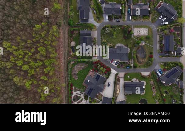 Aerial drone view of an ecovillage with sustainable homes, shared ...