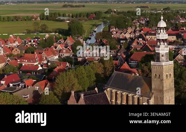 Aerial drone view of the Grote Kerk Hielpen in Hindeloopen, Friesland ...