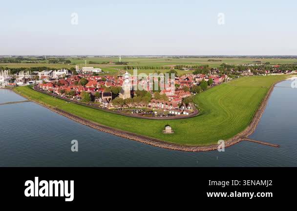 Aerial drone view of the Grote Kerk Hielpen in Hindeloopen, Friesland ...