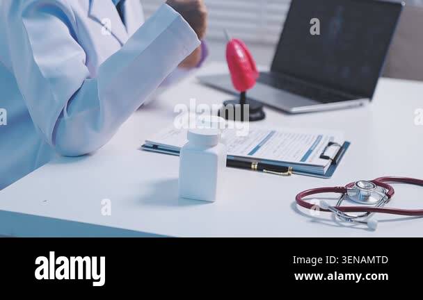 medical doctor holding pills in hand Stock Video Footage - Alamy