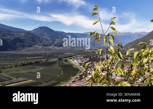 Breathtaking high angle view of a sunlit alpine valley featuring ...