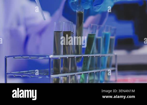 scientist with test tube Stock Video Footage - Alamy