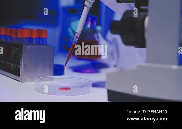 close up of a laboratory glass with a red liquid Stock Video Footage ...