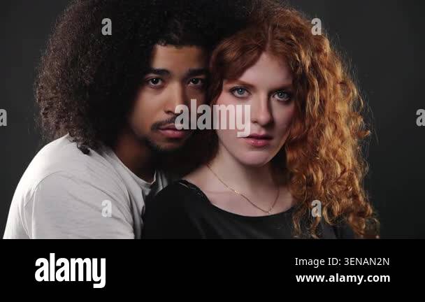 Diverse Couple Portrait, Young Man And Woman With Curly Hair Looking At ...