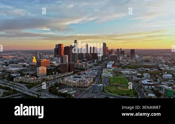 Los Angeles skyline at sunset. LA skyscrapers in dusk with traffic ...