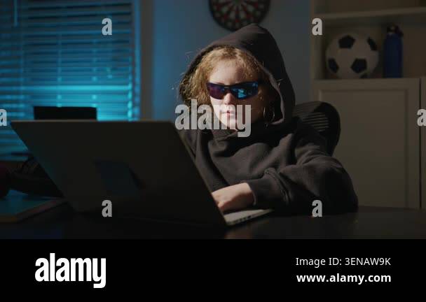 Kid hacker practicing safe hacking concepts. Kid hacker learning ...